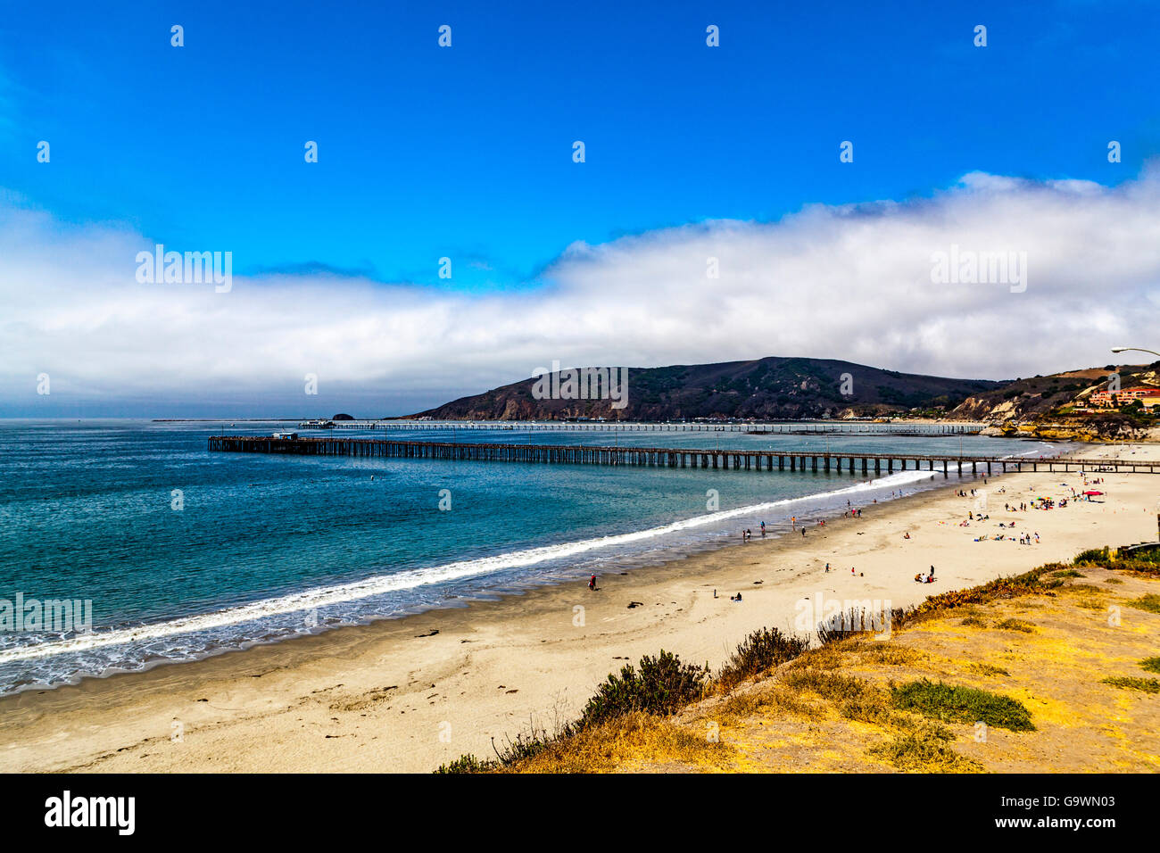 Sailboats, beach, and piers at Avila Beach California along the central ...