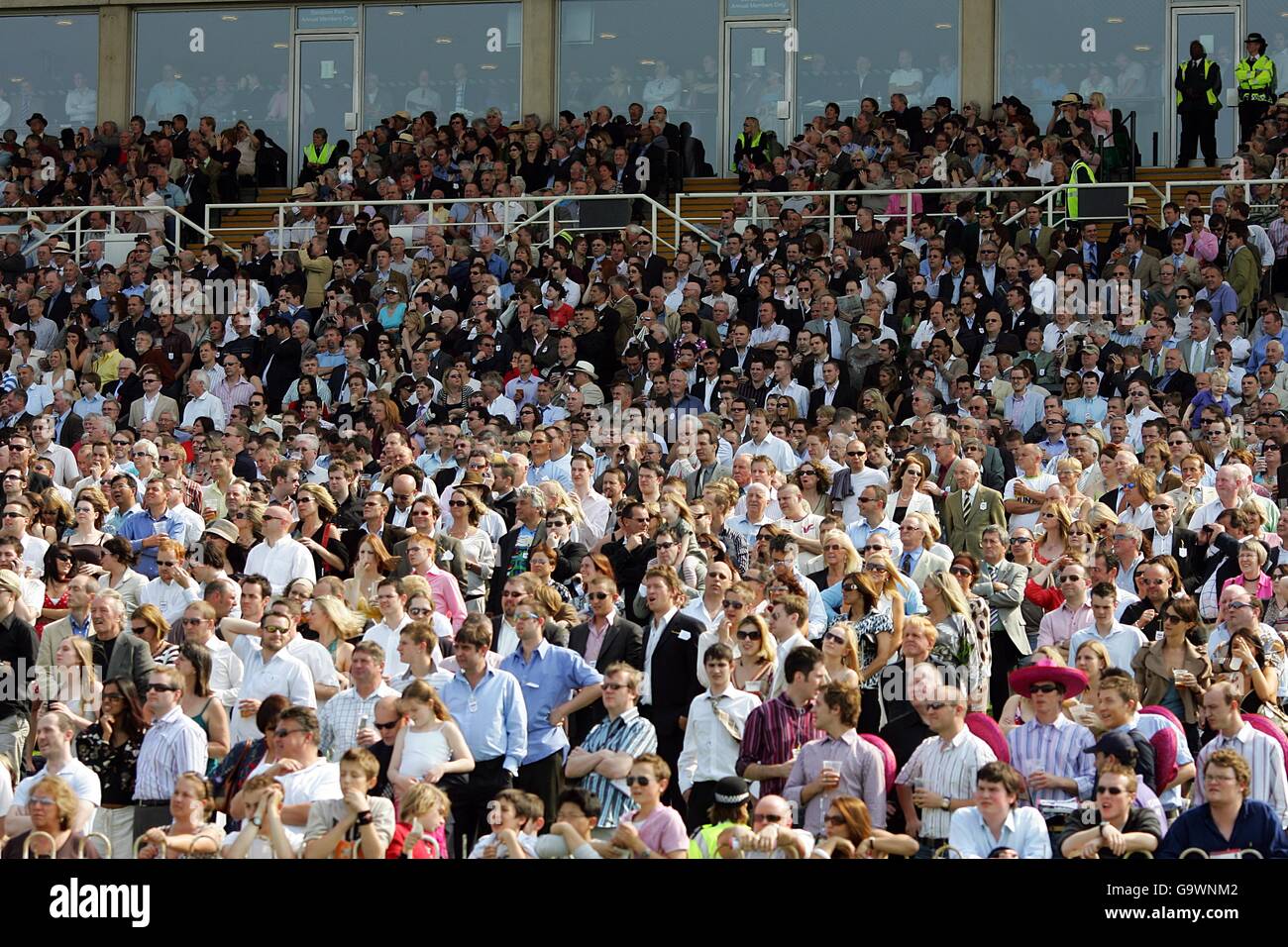 Spectators enjoy the atmosphere, trackside in front of the main ...