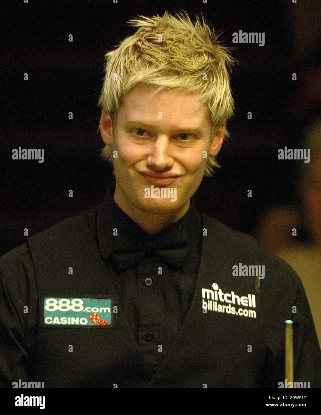 Australia's Neil Robertson reacts to a shot during the second round ...