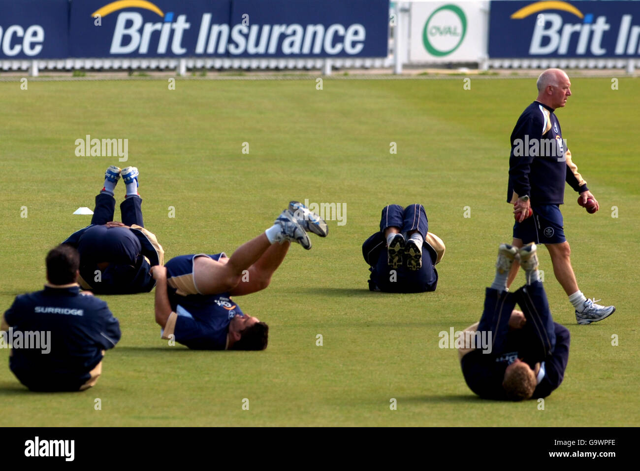 Surrey coach alan butcher watches over warm up hi-res stock photography ...