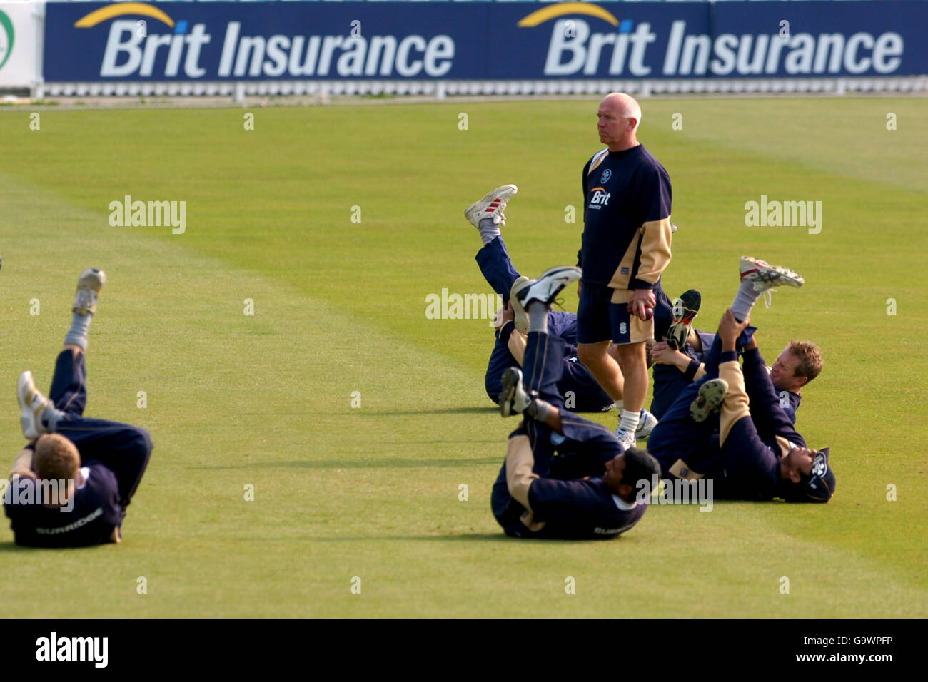 Surrey coach alan butcher watches over warm up hi-res stock photography ...