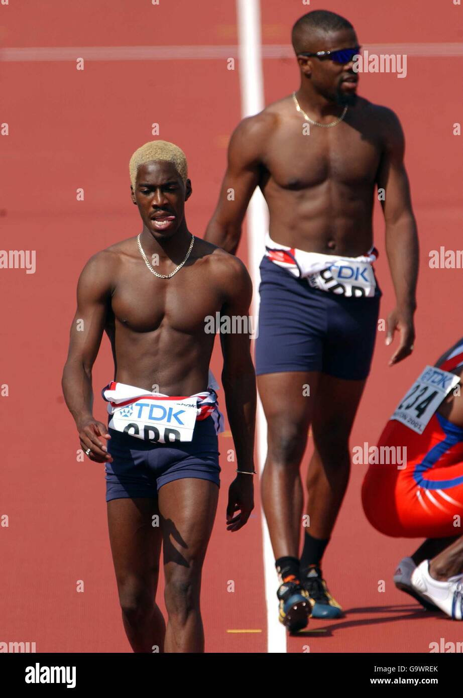 Great Britian's Jonathan Barbour and Christian Malcolm walk dejected ...