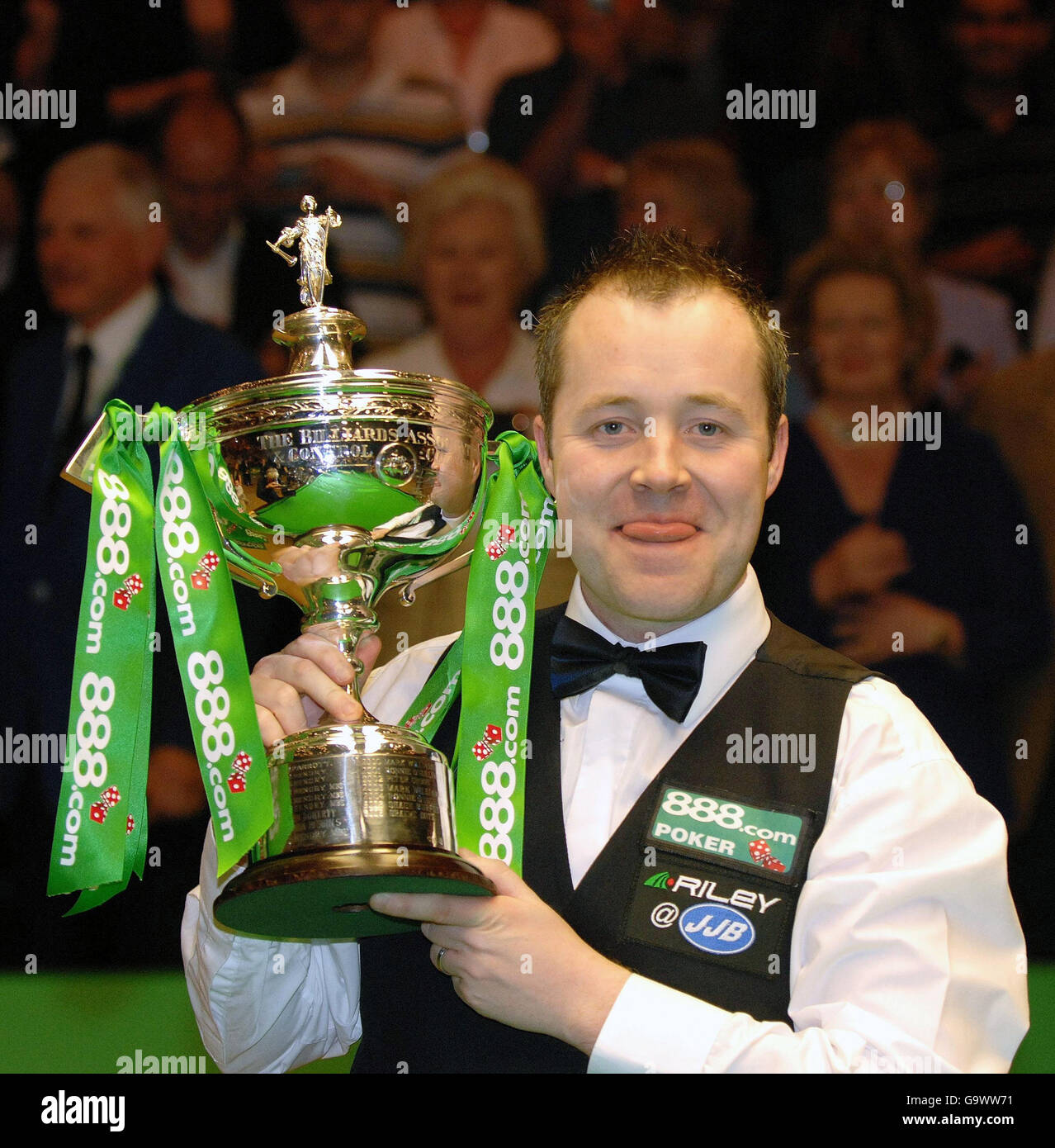 Scotland's John Higgins celebrates with the trophy following his ...