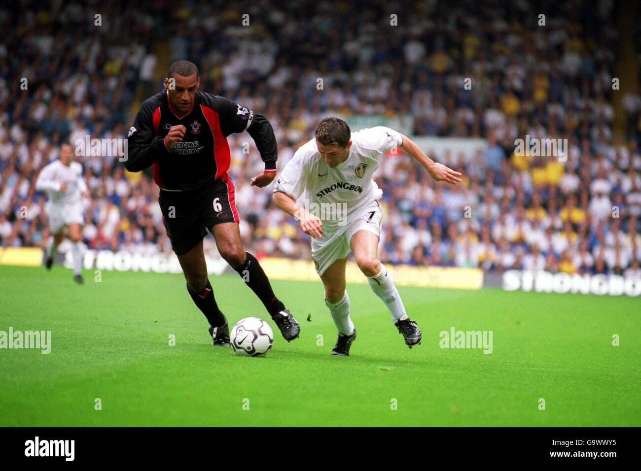 Leeds uniteds robbie keane under pressure from southamtons dean ...