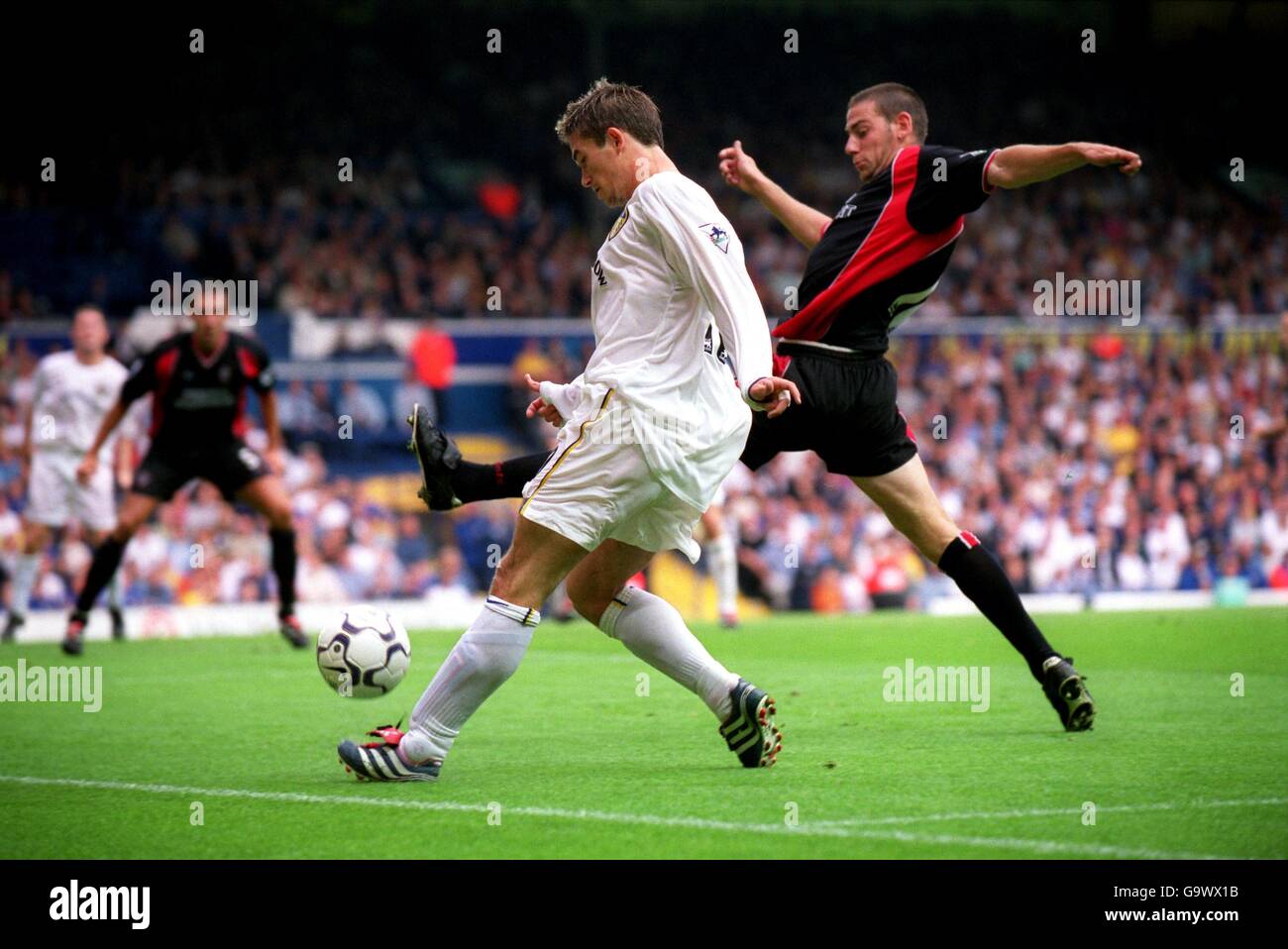 Leeds United's Harry Kewell under pressure from Southampton's Rory ...