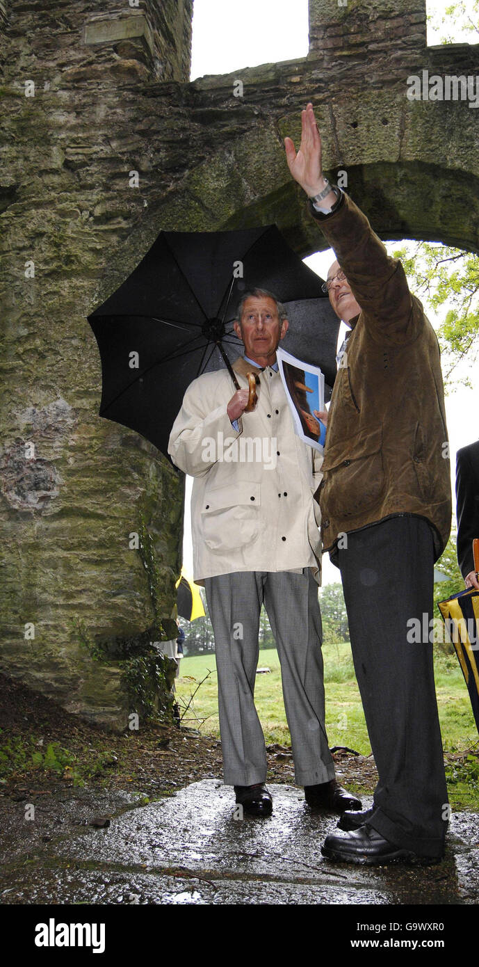 The Prince of Wales is shown around the Holmbush Mine site by the ...