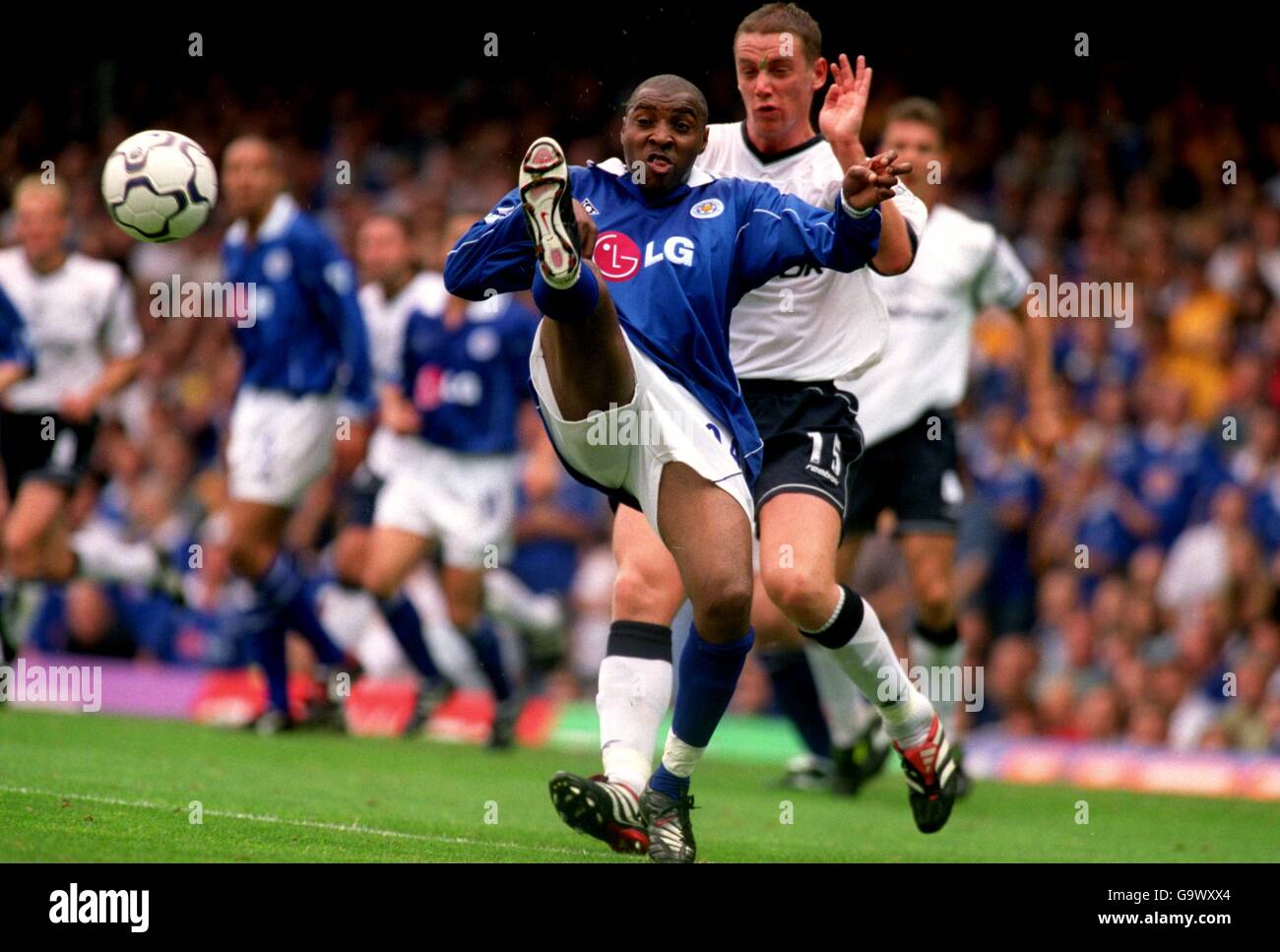 Leicester City's Andy Impey (l) flickls the ball on under pressure from ...