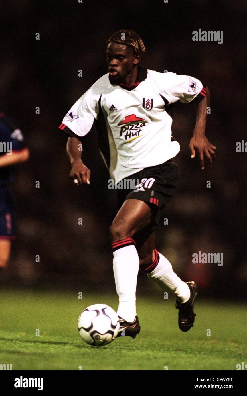 Fulham's Louis Saha hones in on goal to score the deflected 2nd goal ...