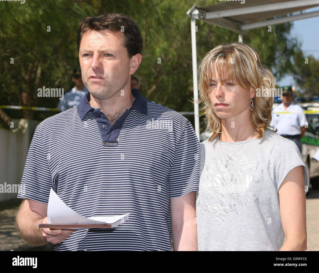 Gerry McCann gives a statement to the media as his wife Kate stands by ...