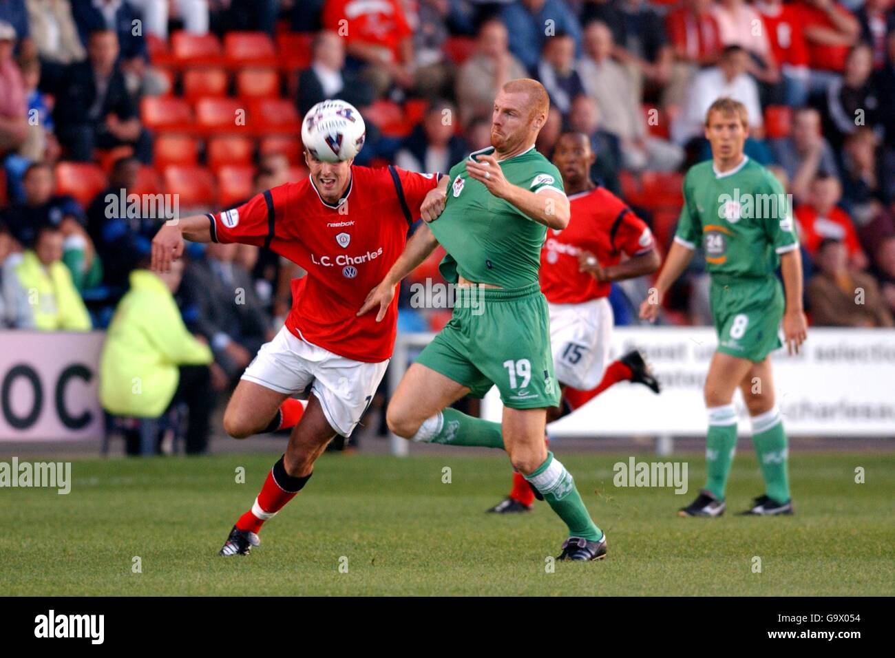 Crewe alexandras robert hulse is held by millwalls sean dyche hi-res ...