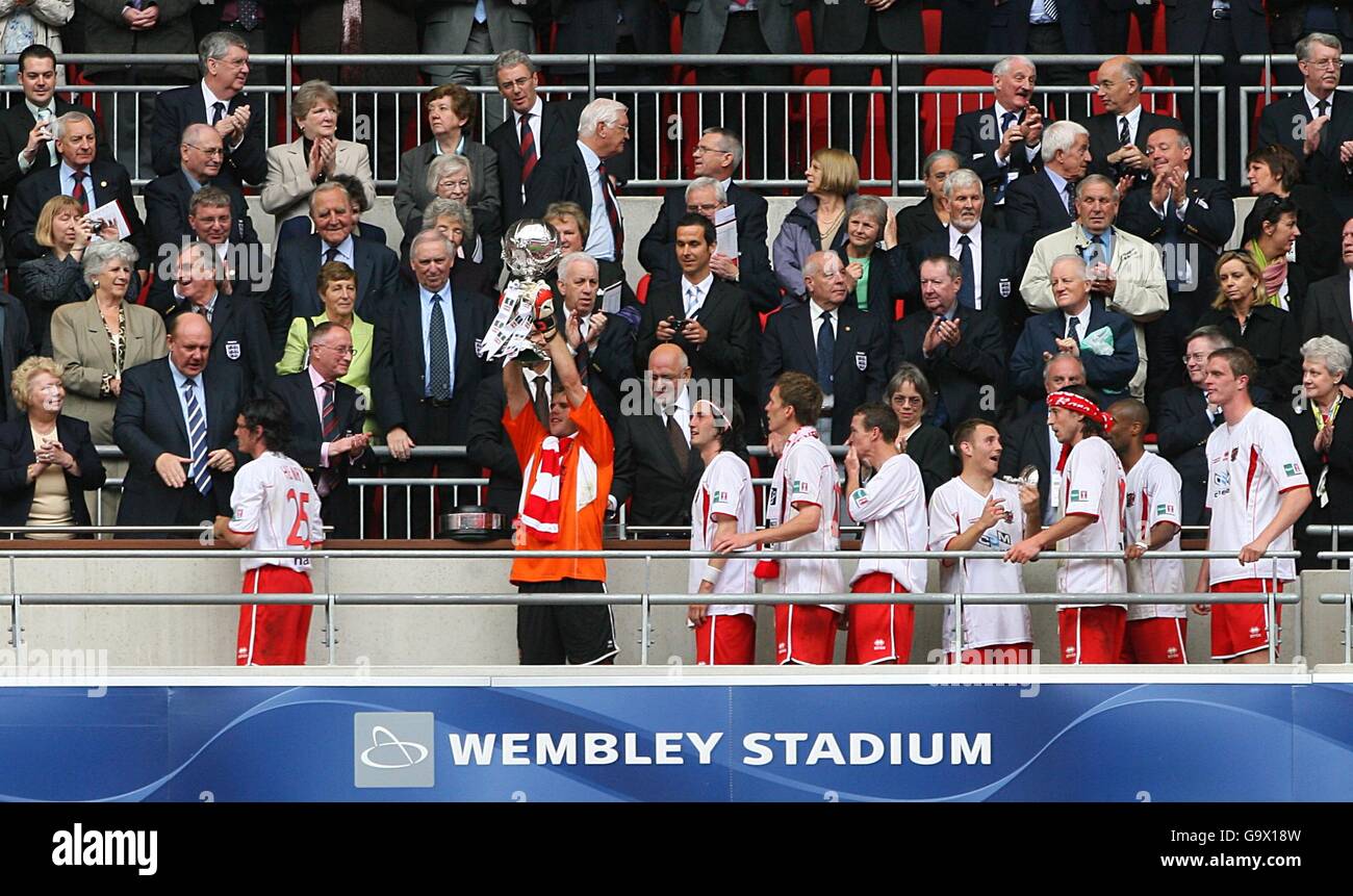 Stevenage Borough goalkeeper Alan Julian lifts the FA Trophy Stock ...