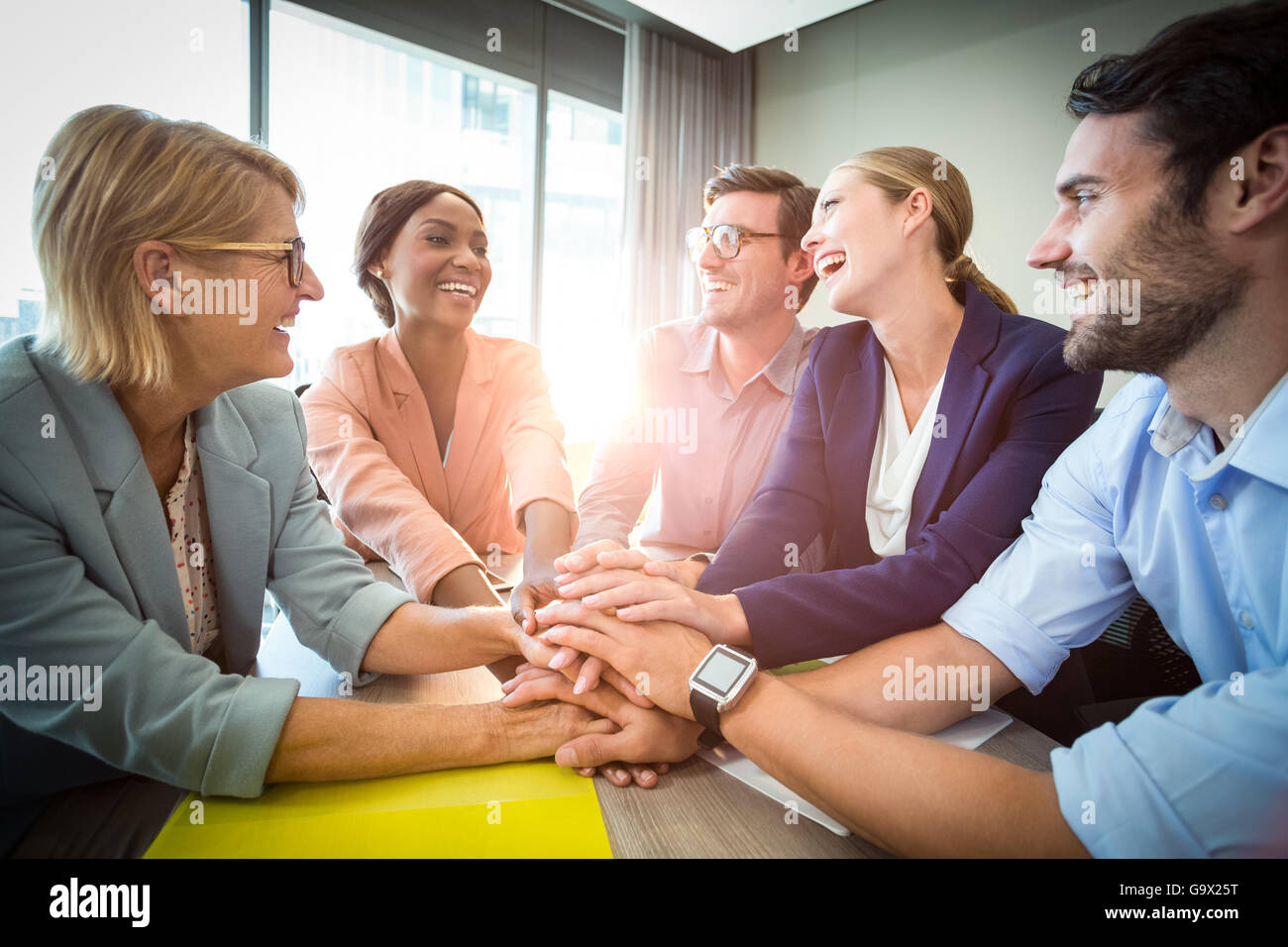 Hand stacked hi-res stock photography and images - Alamy