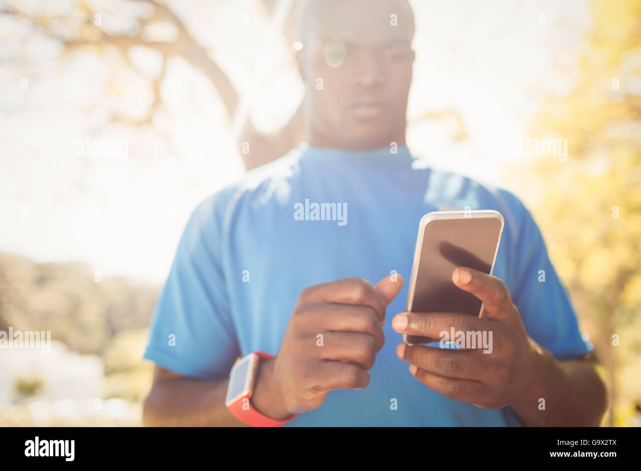 Man holding his phone Stock Photo - Alamy