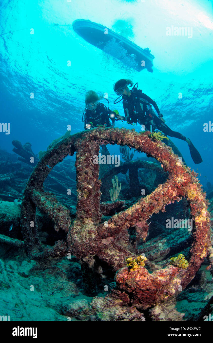 diver at wreck with big steel wheel, wreck Monica, Punta Cana ...
