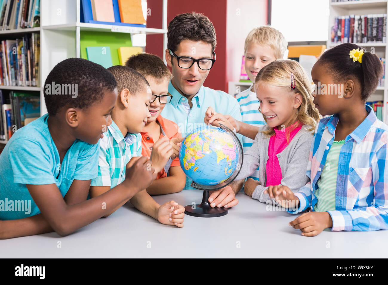 Adult holding discussion with kids hi-res stock photography and images ...