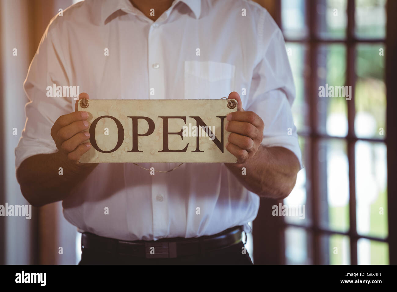 Man holding sign hi-res stock photography and images - Alamy