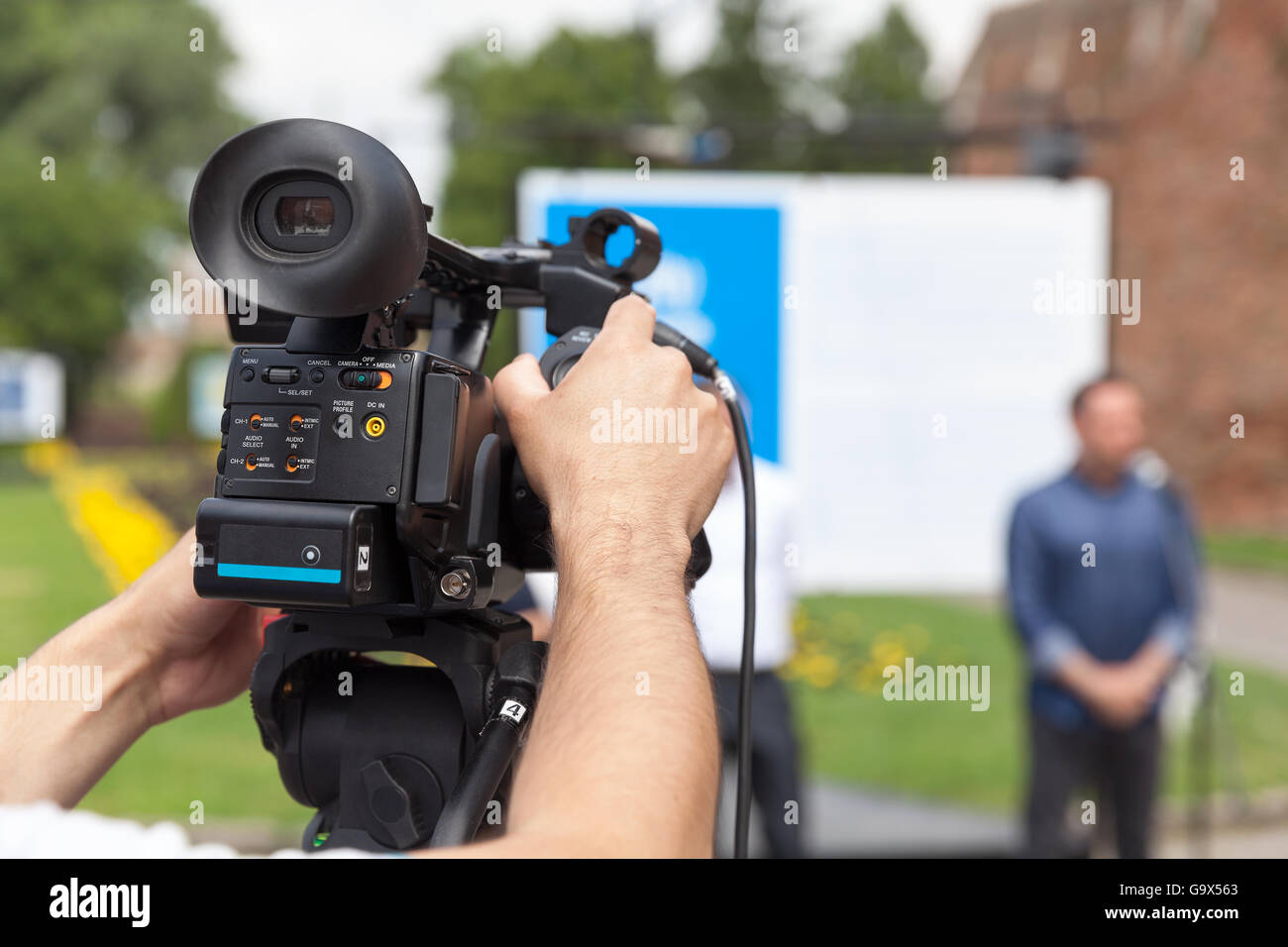 Filming press conference with a video camera Stock Photo - Alamy