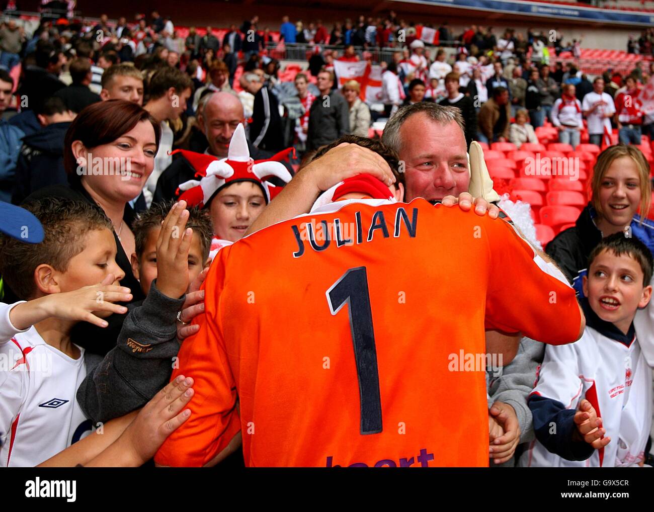 Stevenage Borough goalkeeper Alan Julian celebrates with his family ...