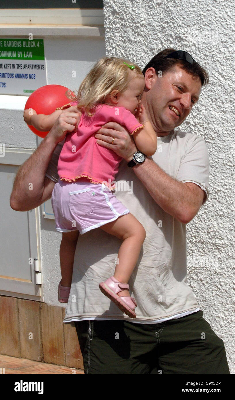 Gerry McCann with his daughter Amelie as they arrive back at their ...