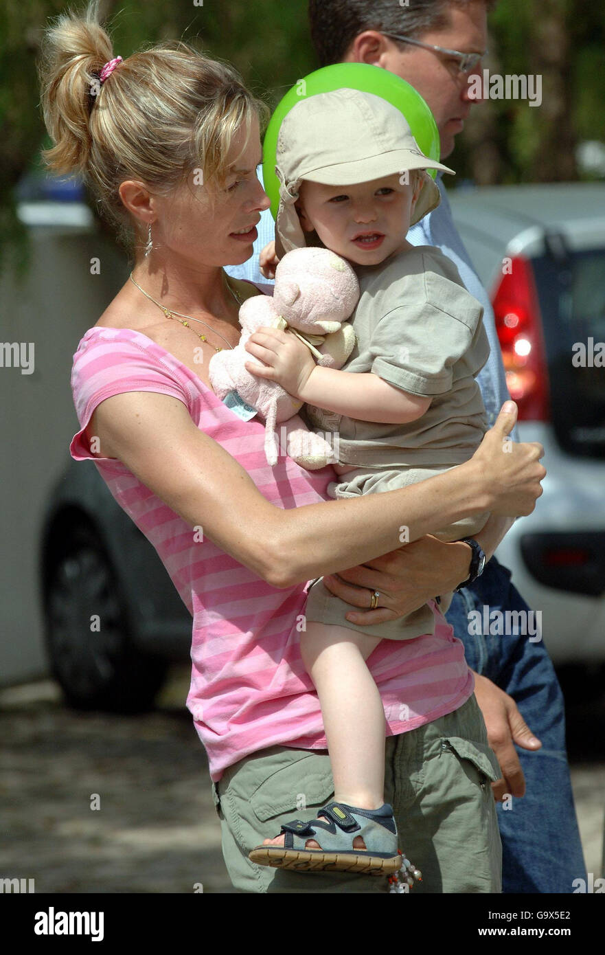 Kate McCann carries son Sean as they arrive back at their apartment in ...