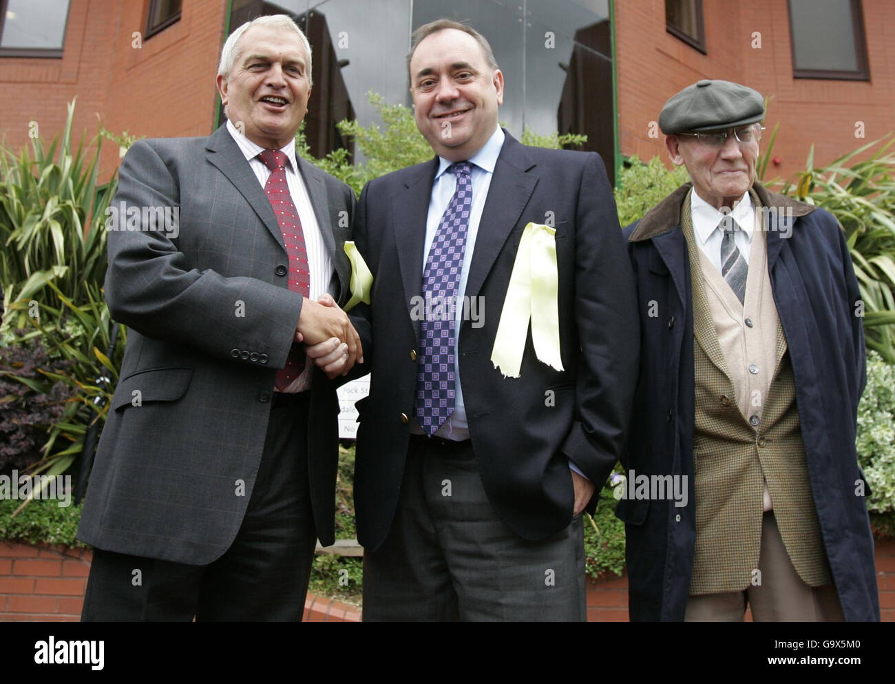 SNP leader Alex Salmond (centre) shakes hands with Brian Dempsey, as he ...