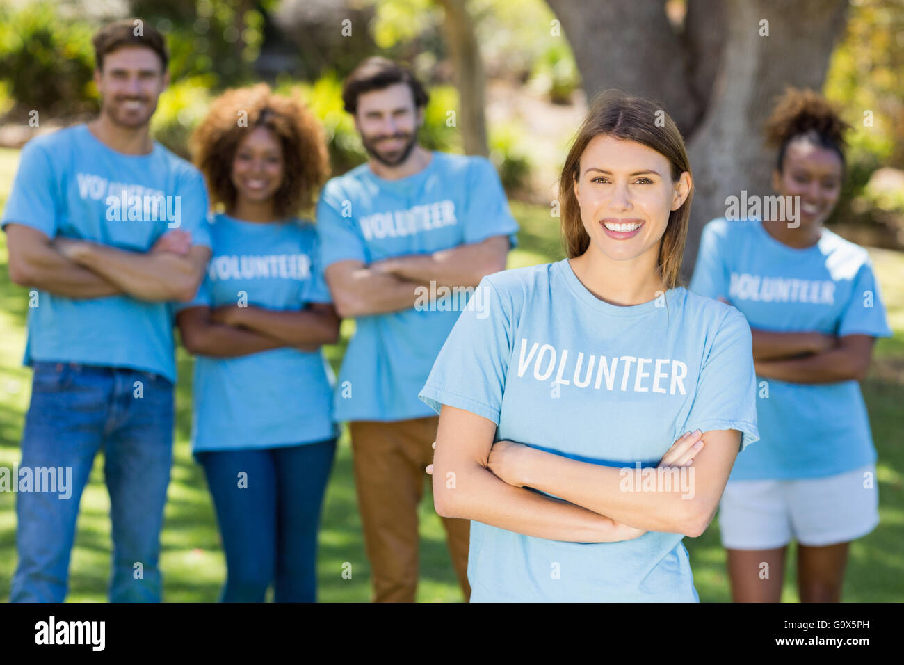 Man volunteer posing smiling hi-res stock photography and images - Alamy