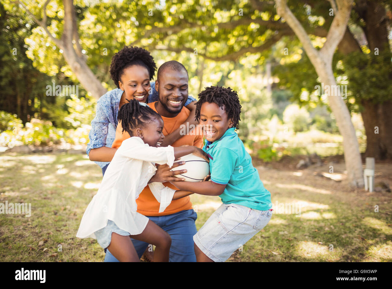 Happy family having fun Stock Photo - Alamy