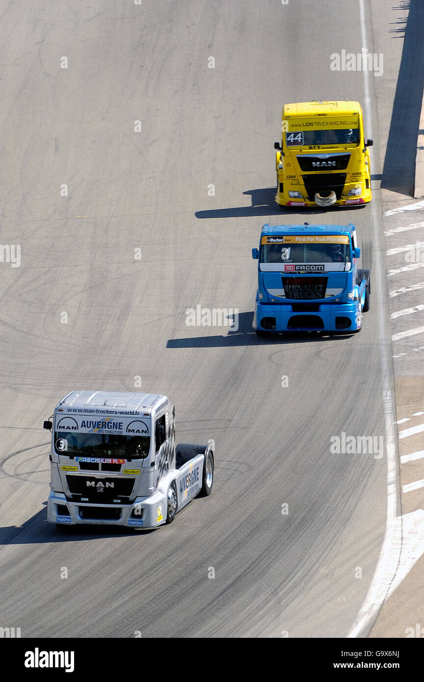 in full race trucks during truck racing championship of France on Ales ...