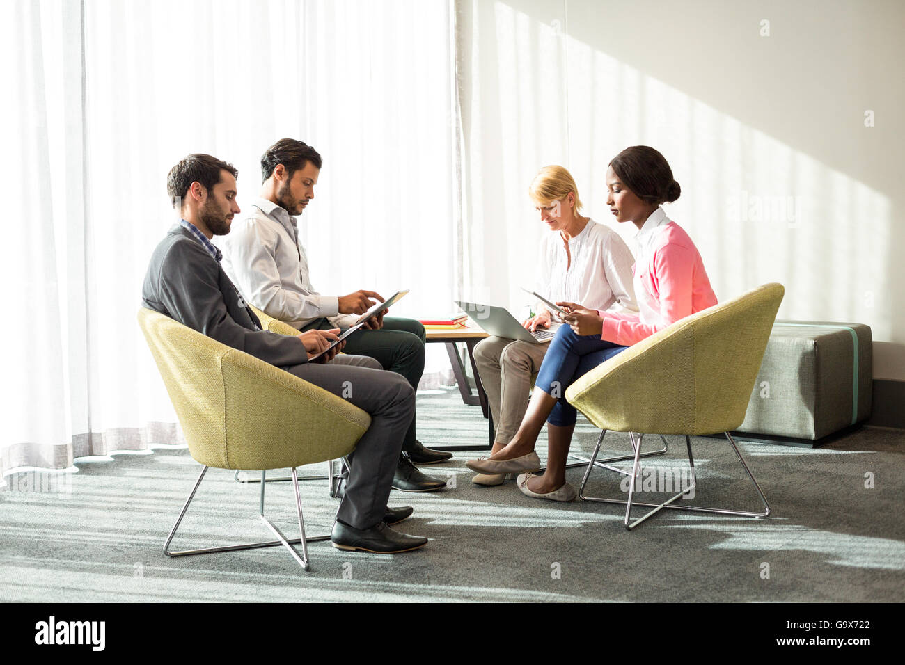 Business people using mobile phone, digital tablet and laptop Stock ...