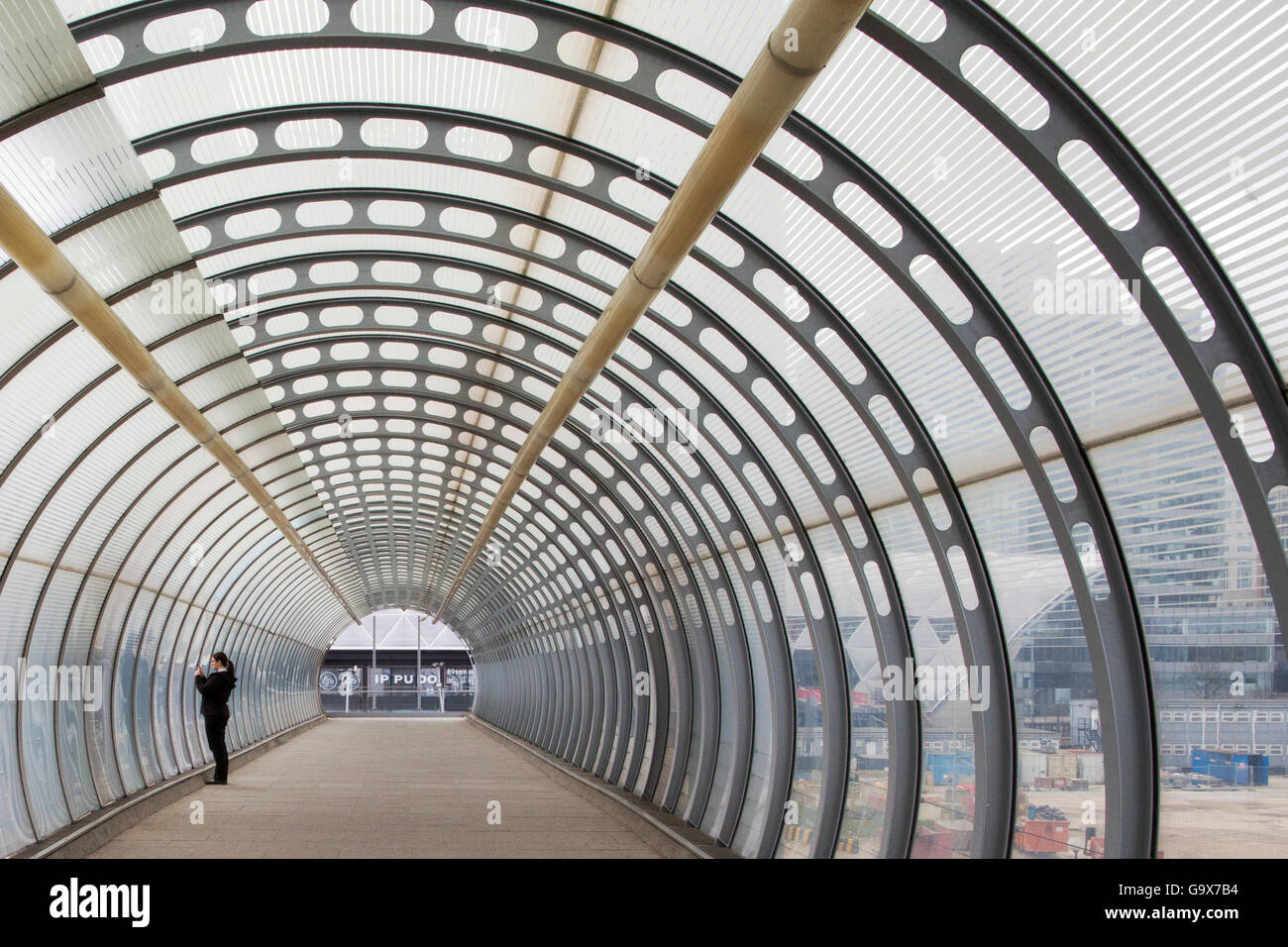 Poplar tunnel - walkway at DLR Docklands Light Railway station, London ...