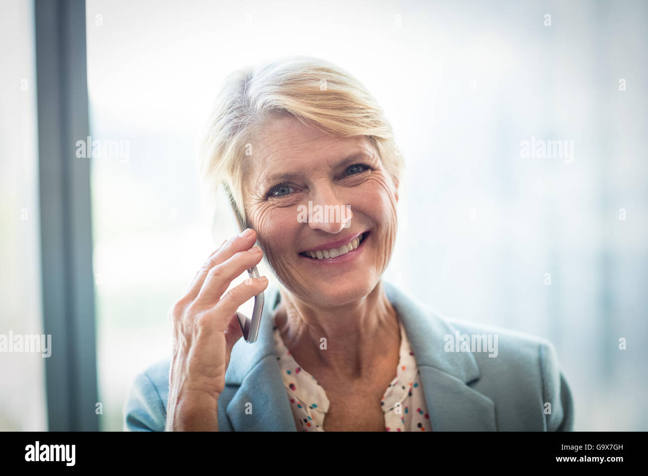 Professional woman talking on cell hi-res stock photography and images ...