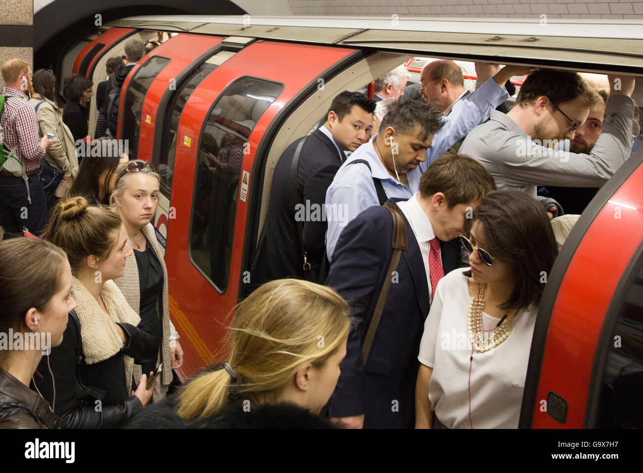People on The London Underground in London Stock Photo - Alamy