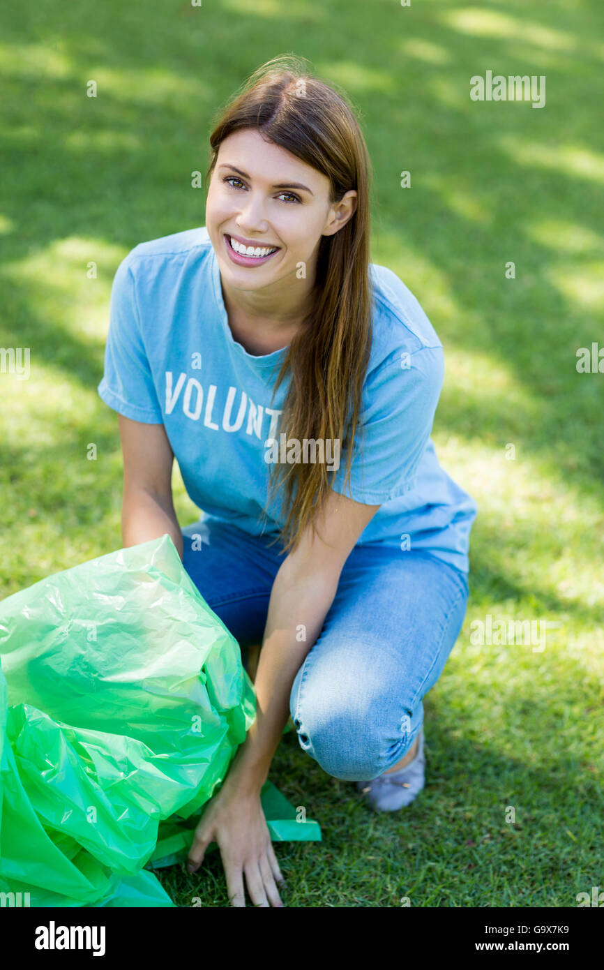 Woman rubbish bag hi-res stock photography and images - Alamy