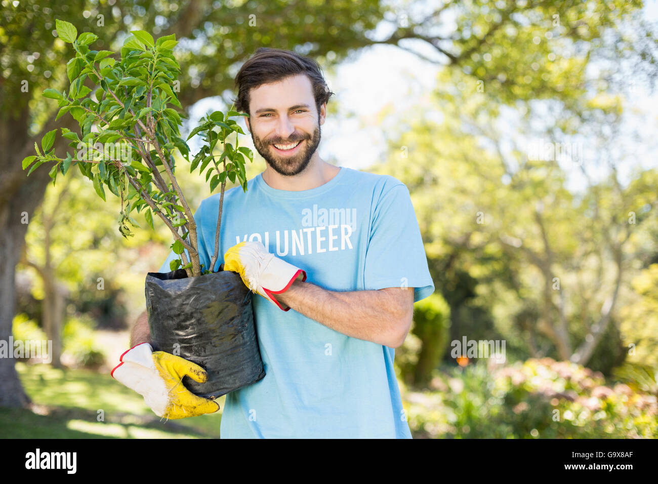 Young caucasian man volunteer hi-res stock photography and images - Alamy