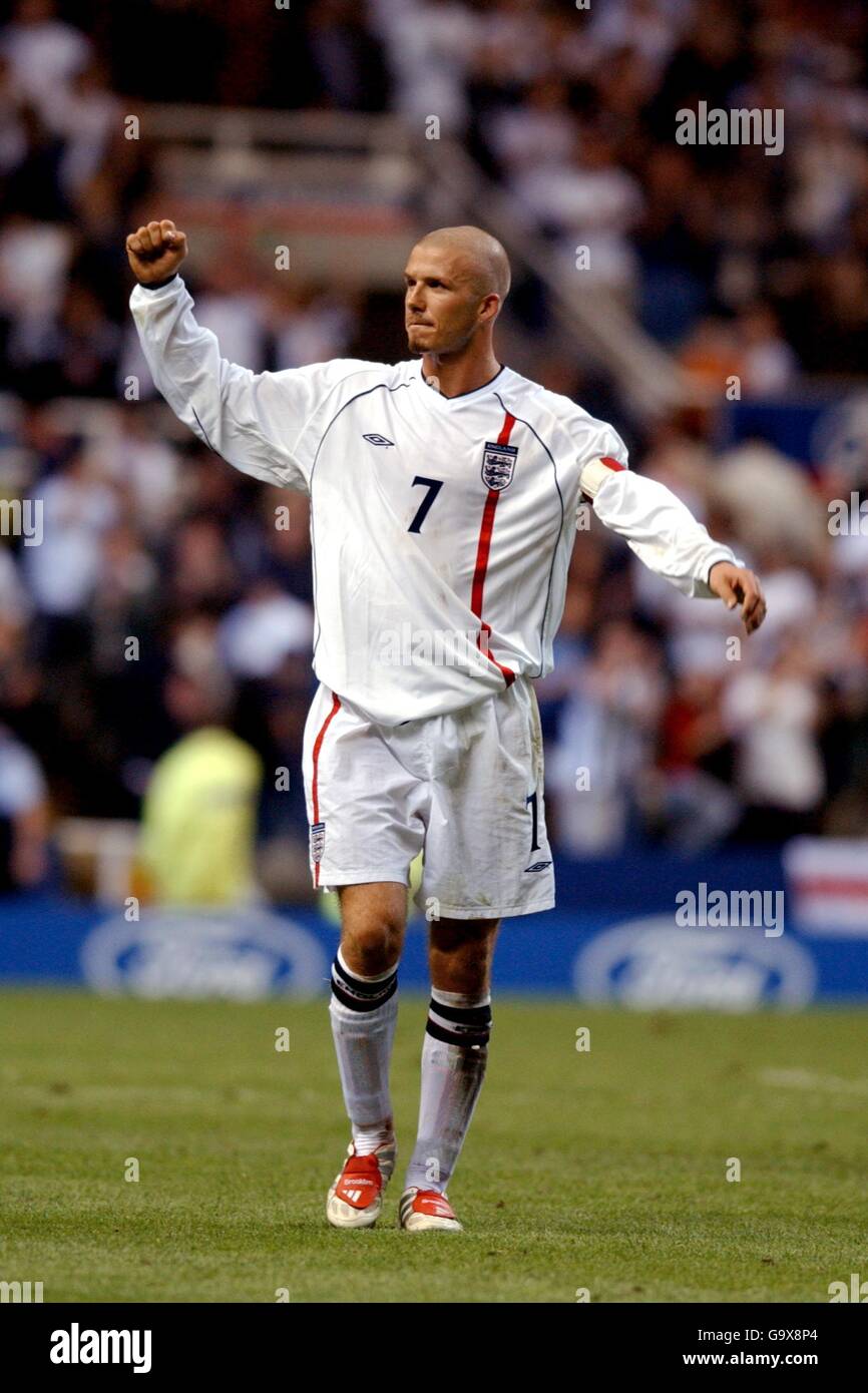 England's captain David Beckham celebrates their victory against ...