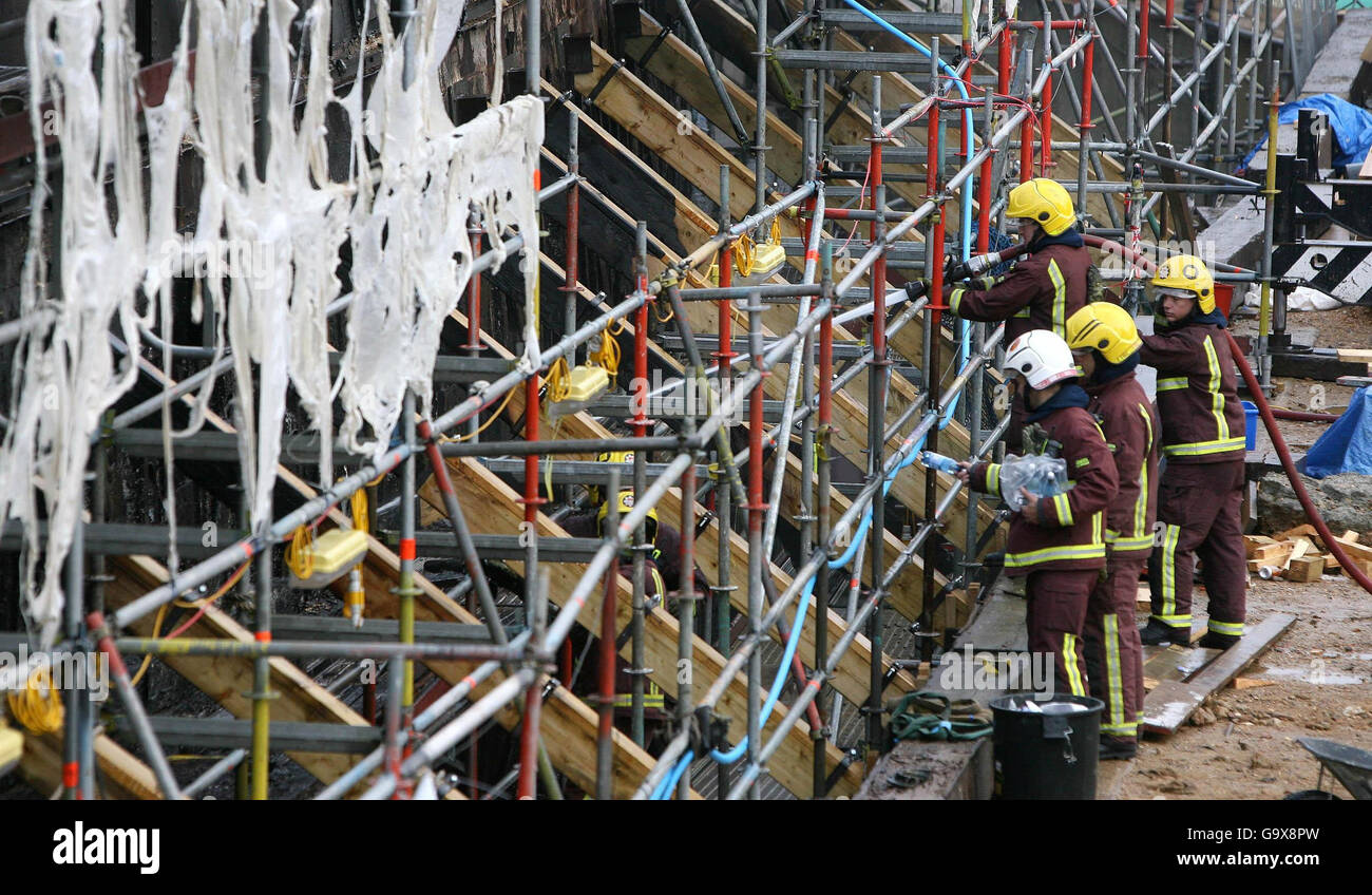 Firefightersput out the fire on the 19th-century clipper The Cutty Sark ...