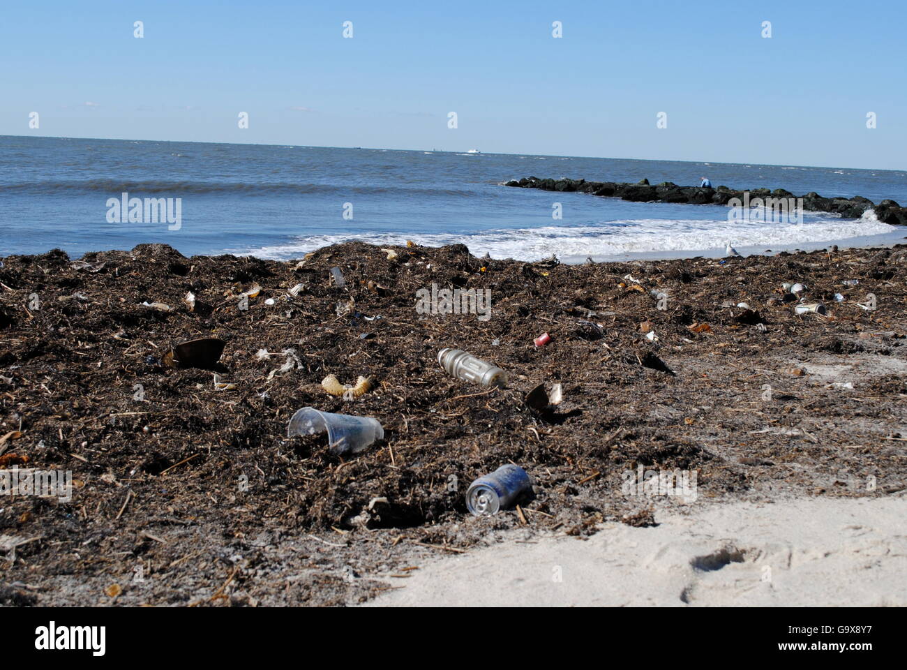 Trash on Beach Stock Photo - Alamy