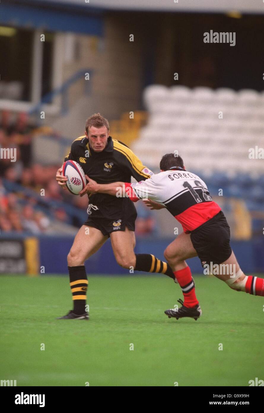 L r london wasps paul sampson takes on saracens kevin sorrell hi-res ...