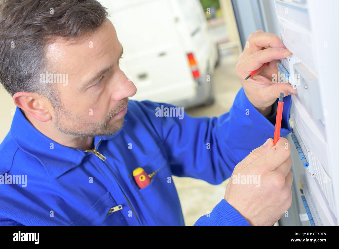 Replacing a fuse Stock Photo - Alamy