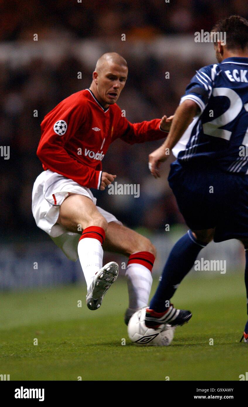Manchester United's David Beckham tries to evade a challenge from Lille ...