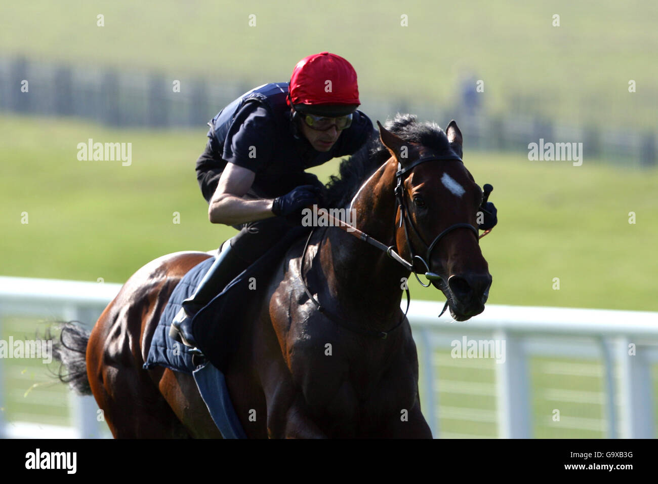 Jockey Ted Durcan on Salford Mill puts his horse through its paces ...