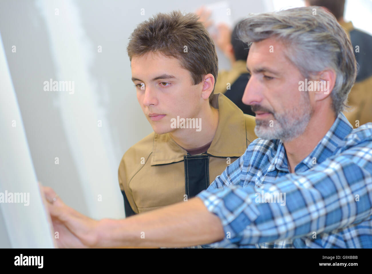 teaching the next generation Stock Photo - Alamy
