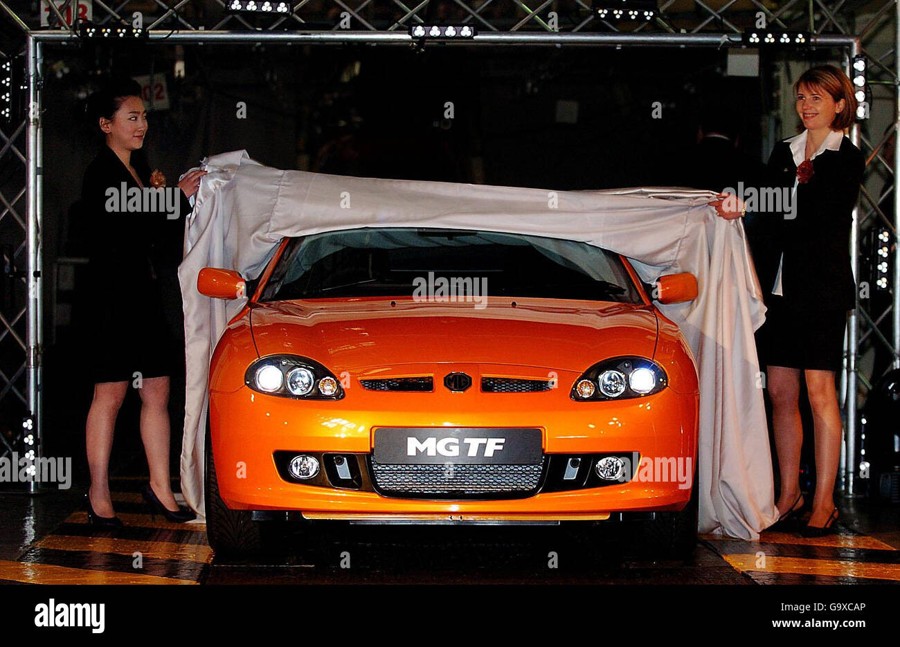 Longbridge plant reopening. A MG TF sports car rolls off the production ...