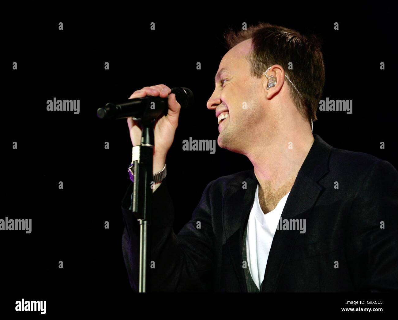 Jason Donovan performing on stage at the Hammersmith Apollo in west ...