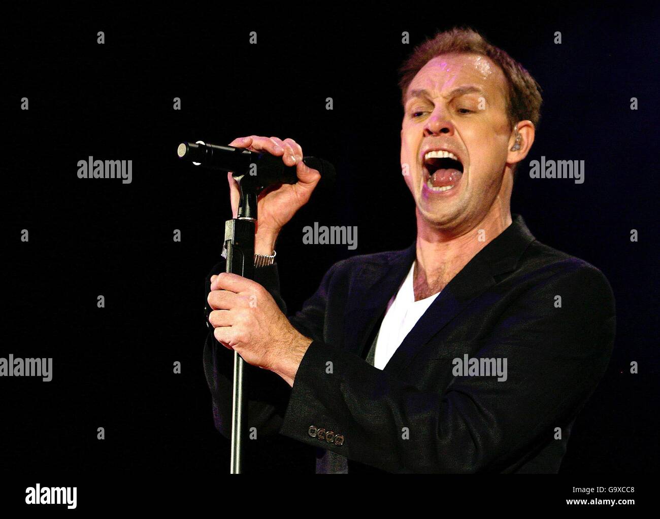 Jason Donovan performing on stage at the Hammersmith Apollo in west ...