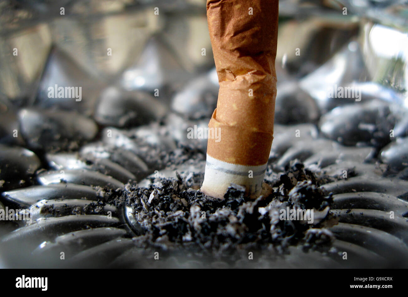 Cigarette ashtray stubbed out hi-res stock photography and images - Alamy