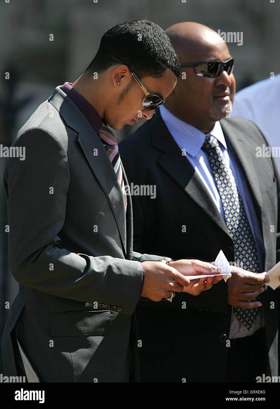 Theo walcott left arrives funeral alan ball winchester cathedral hi-res ...