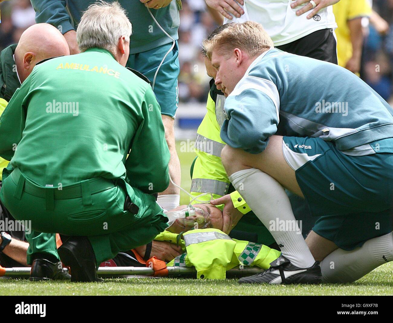 Referee Phil Crossley is to be stretchered off after Derby County's ...