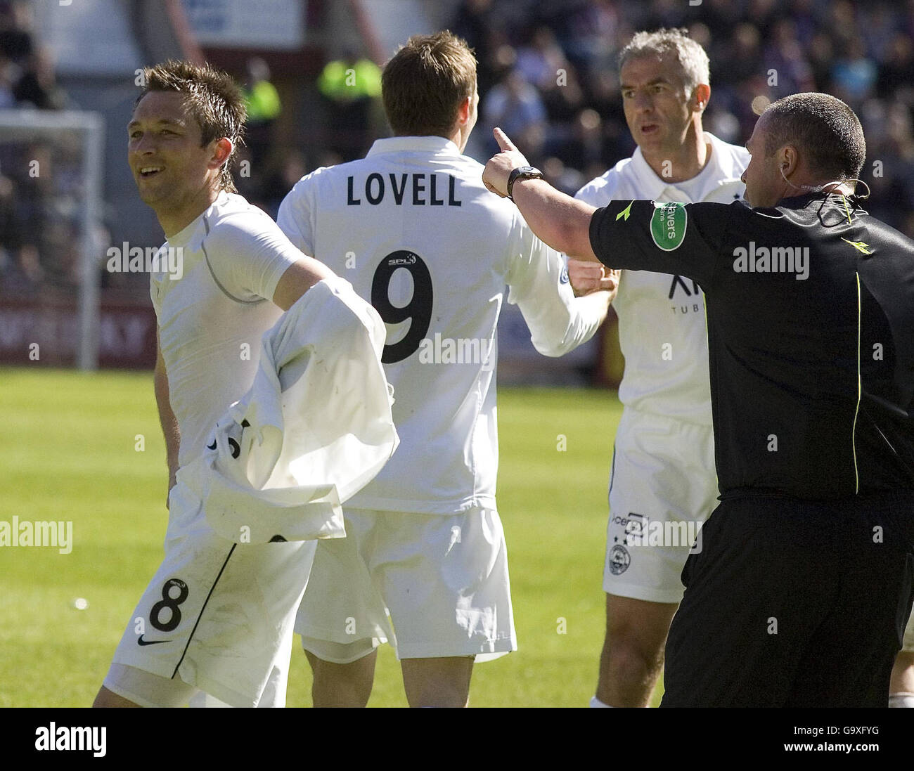 Aberdeen's Barry Nicholson (left) is sent off by referee Brian Winter ...