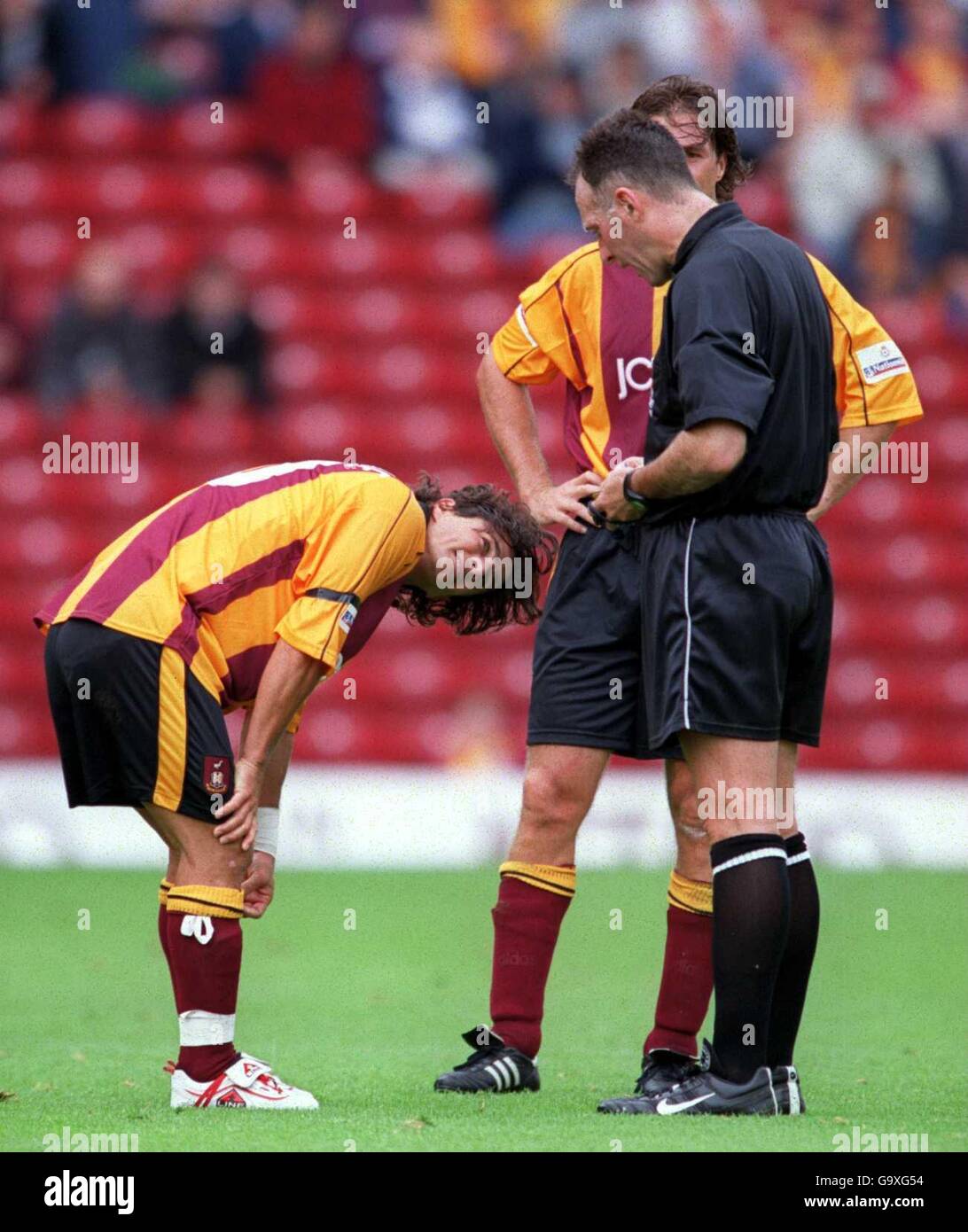 Referee David Pugh (r) books Bradford City's Benito Carbone (l Stock ...